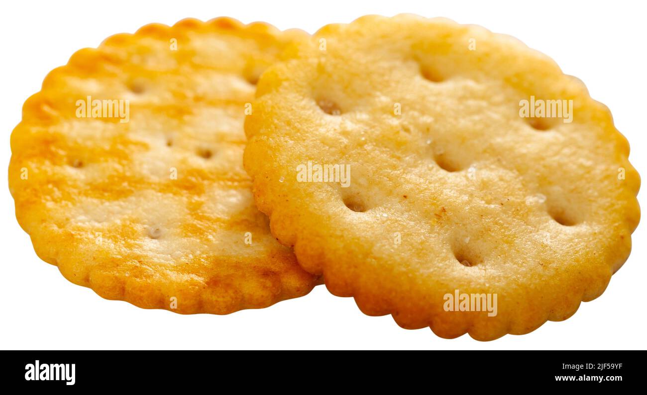 Two round crackers over white background Stock Photo - Alamy