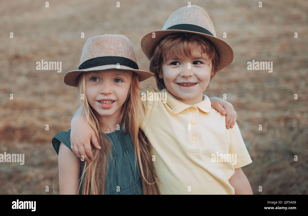 Summer portrait of happy cute child. Happy children farmers having fun ...
