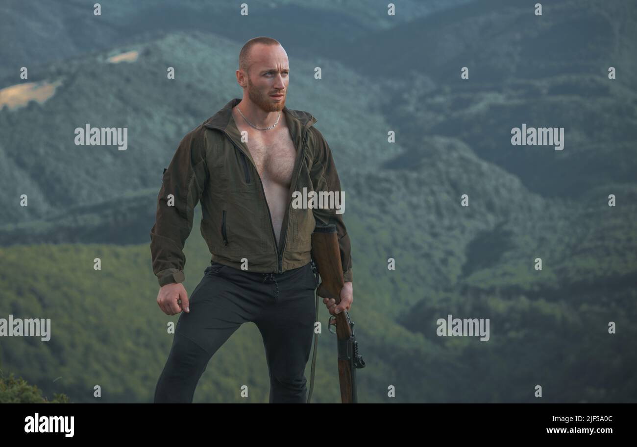 Hunter in camouflage clothes ready to hunt with hunting rifle. Hunter ...