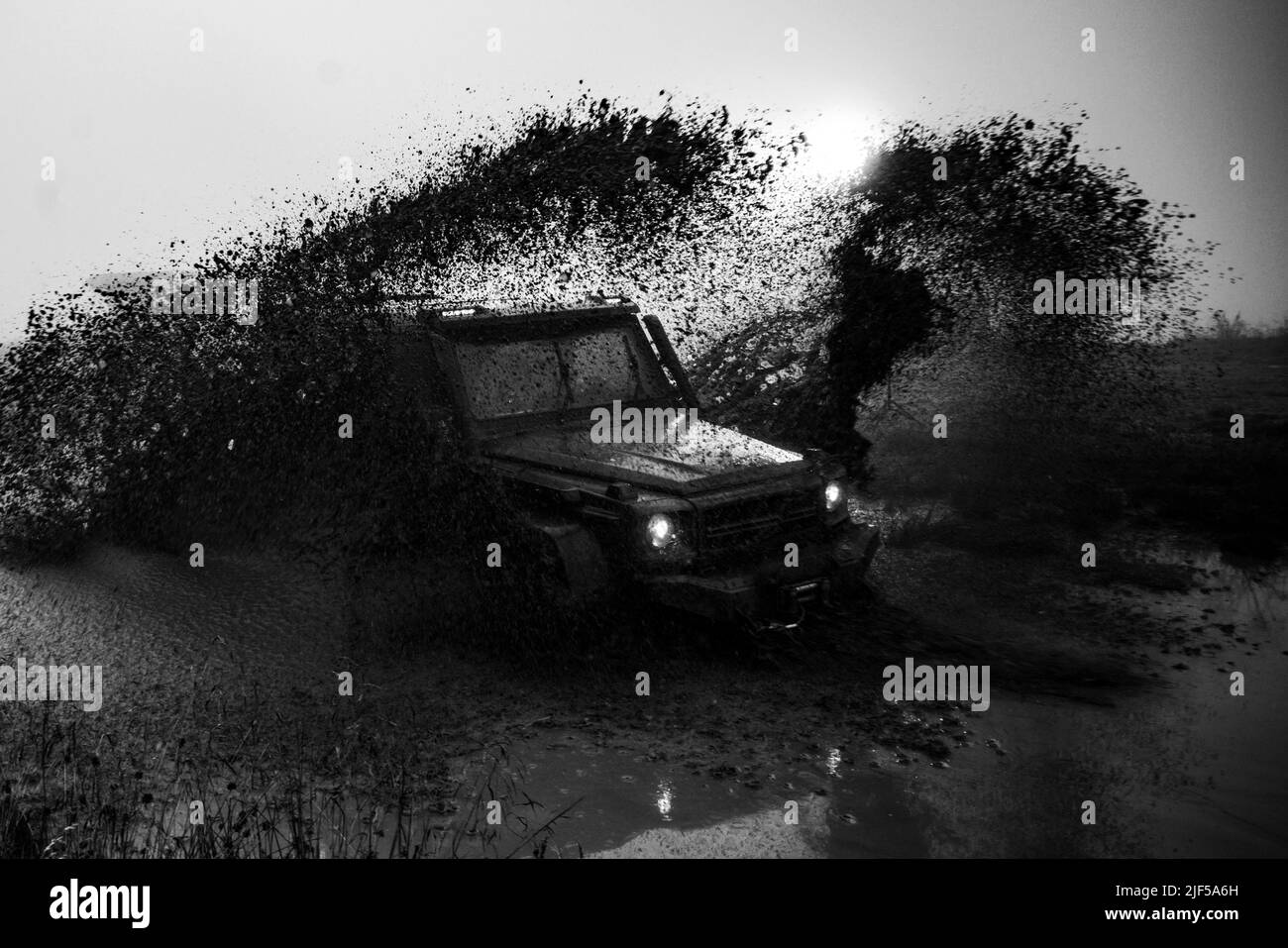 Off-road 4x4 concept. Offroad car on bad road. Water splash in off road ...