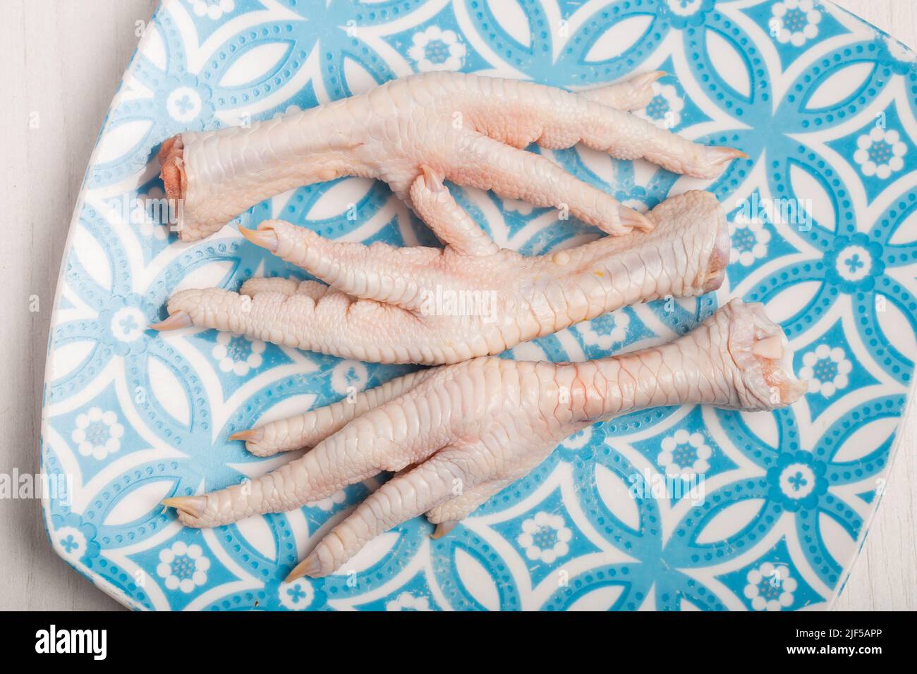 Close up blue chicken legs hi-res stock photography and images - Alamy