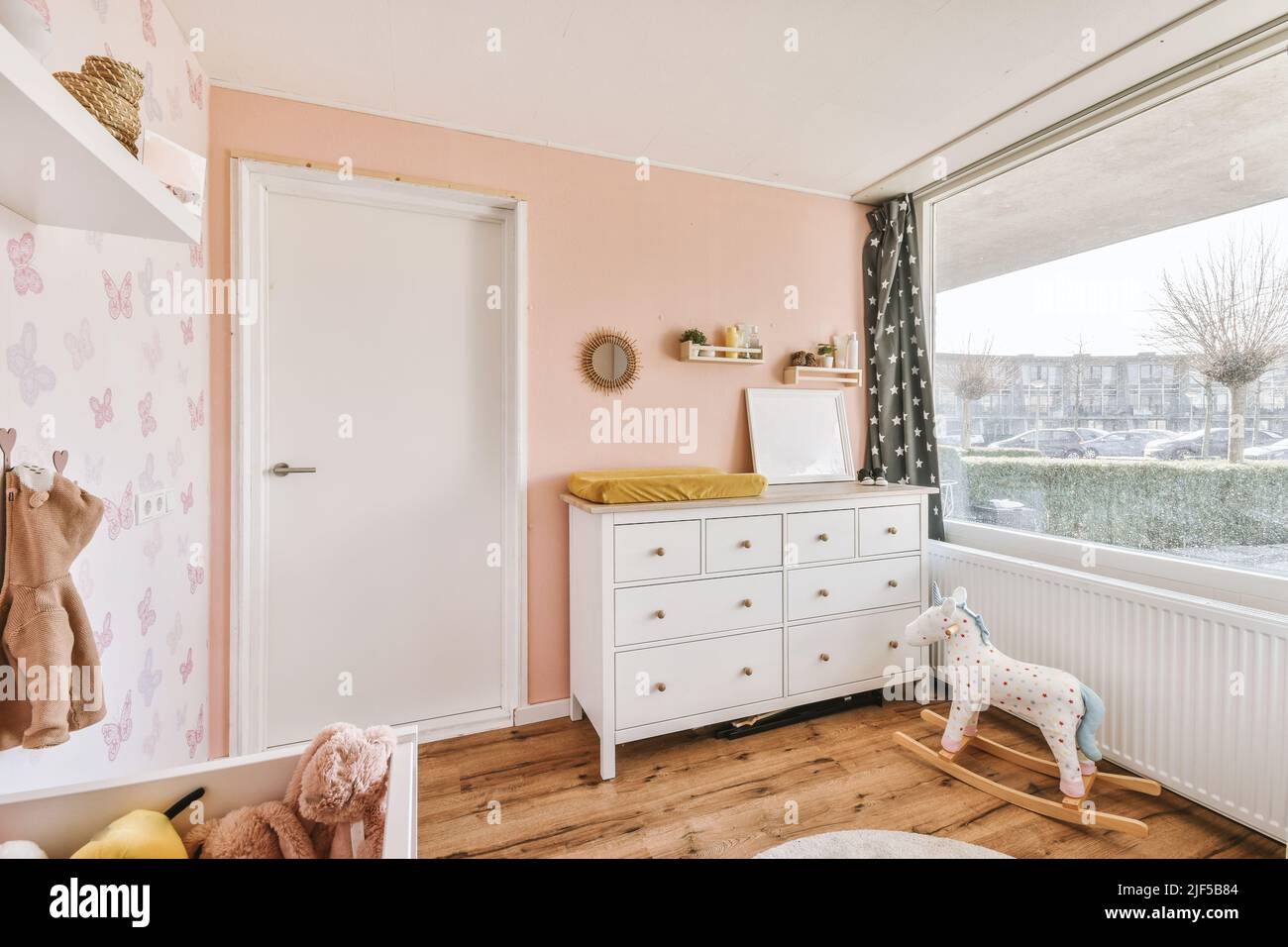 Cute kids room with big windowCozy children's room with a large window ...