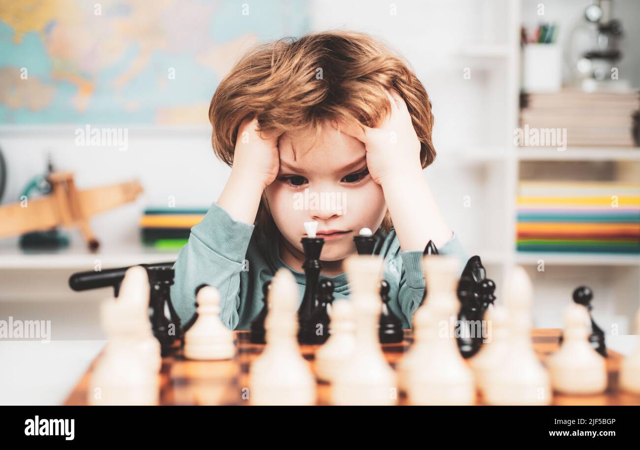 Boy think or plan about chess game, vintage style for education concept ...