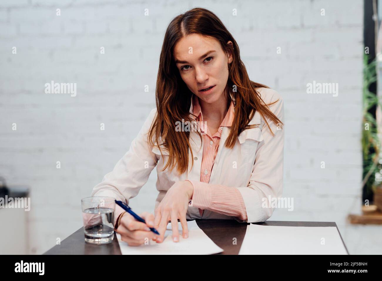 Person listening taking notes hi-res stock photography and images - Alamy