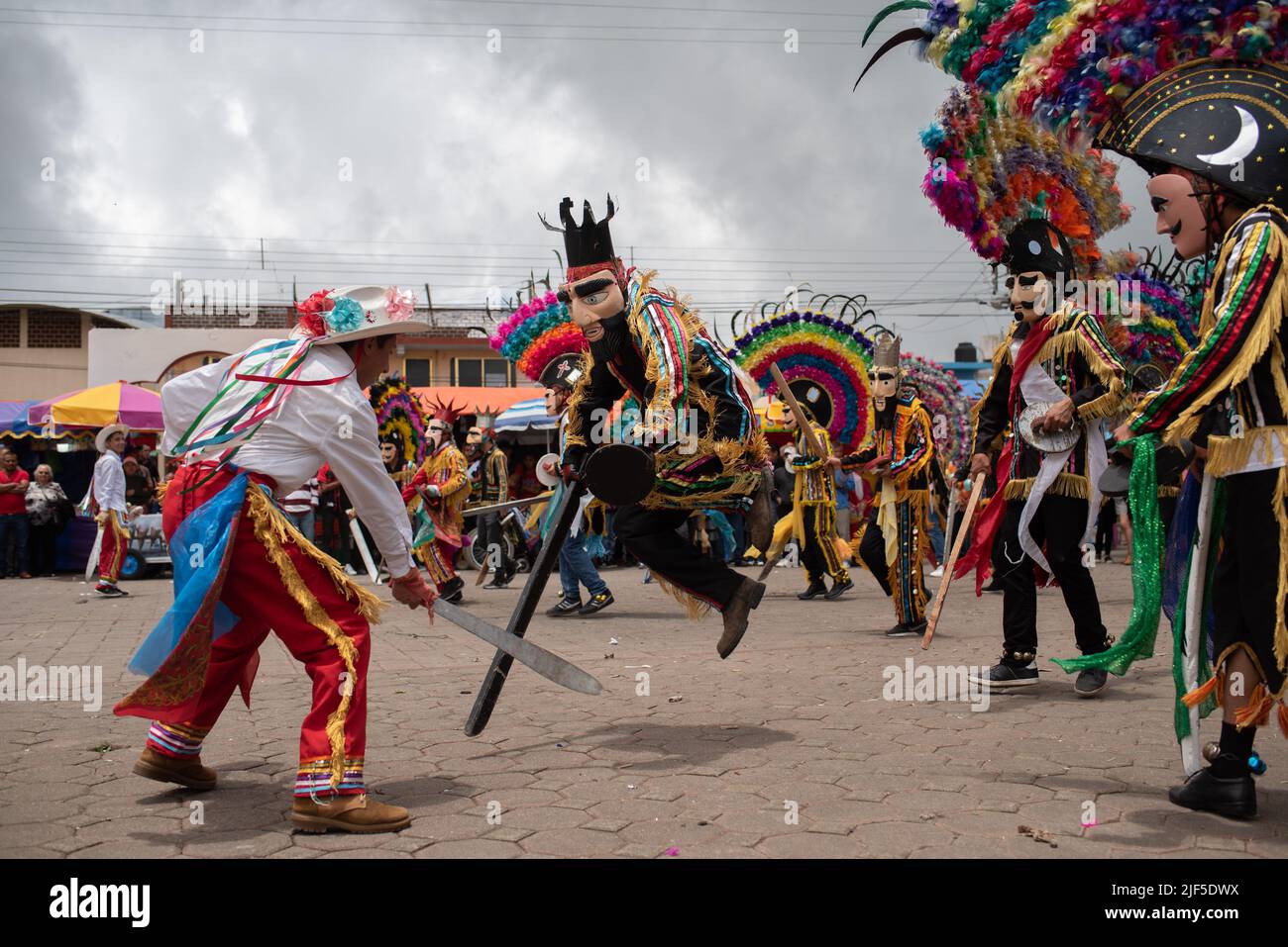 June 29, 2022: Traditional dancers of the ''Santiagos'' dance perform ...