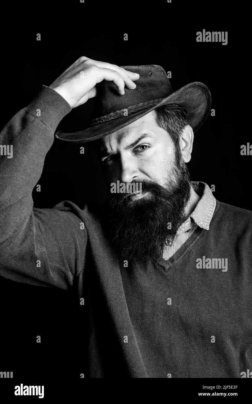 Male retro fashion. Portrait of cowboy in leather hat. American Western ...