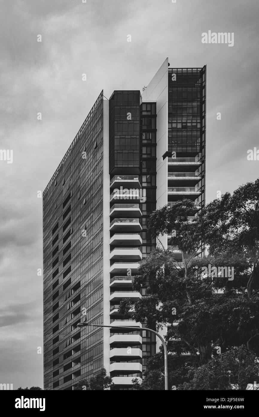 A vertical grayscale shot of a skyscraper in Sydney, Australia Stock ...