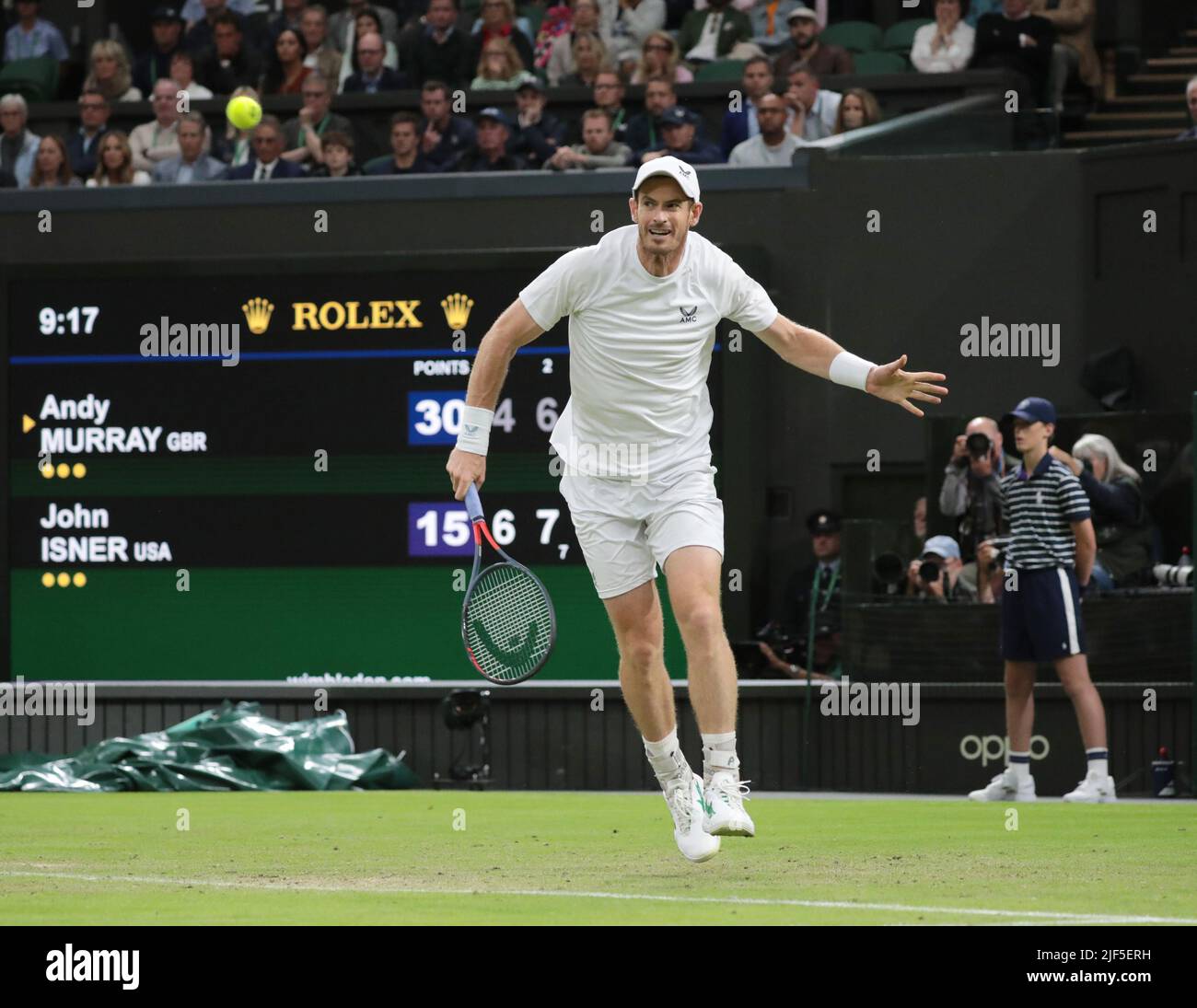 John isner grass hi-res stock photography and images - Alamy