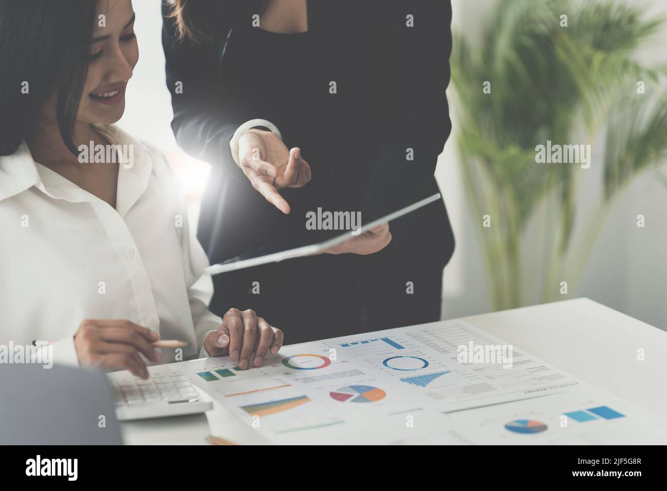 Business team hands at working with financial plan, meeting, discussion ...