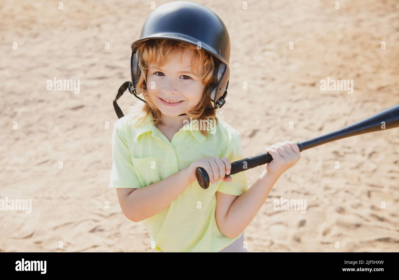 Kid holding a baseball bat. Pitcher child about to throw in youth ...