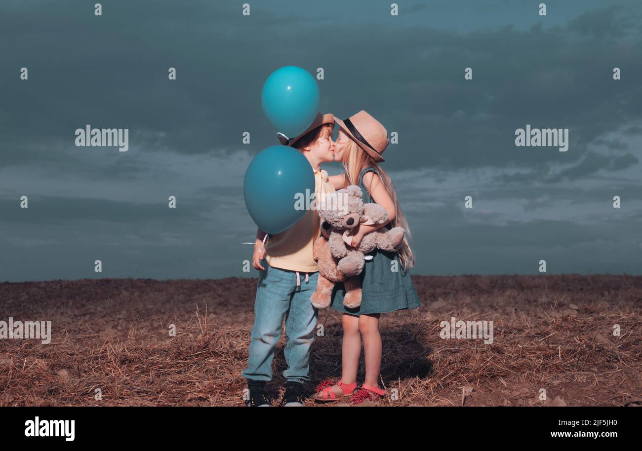 Lovely children. Beautiful little couple - boy and girl embracing ...