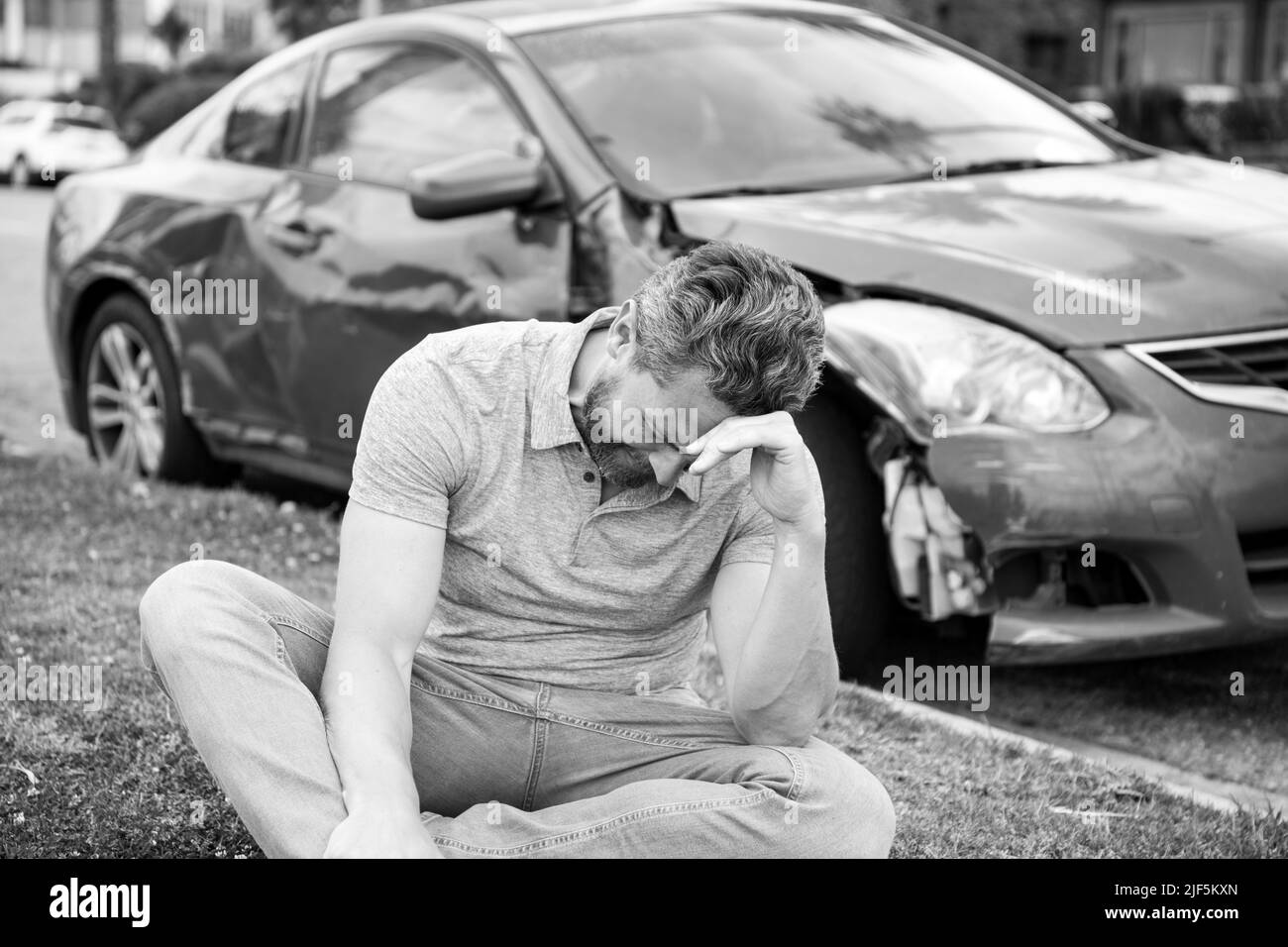 Car insurance. Sad depressed man assistance with car broken on road ...