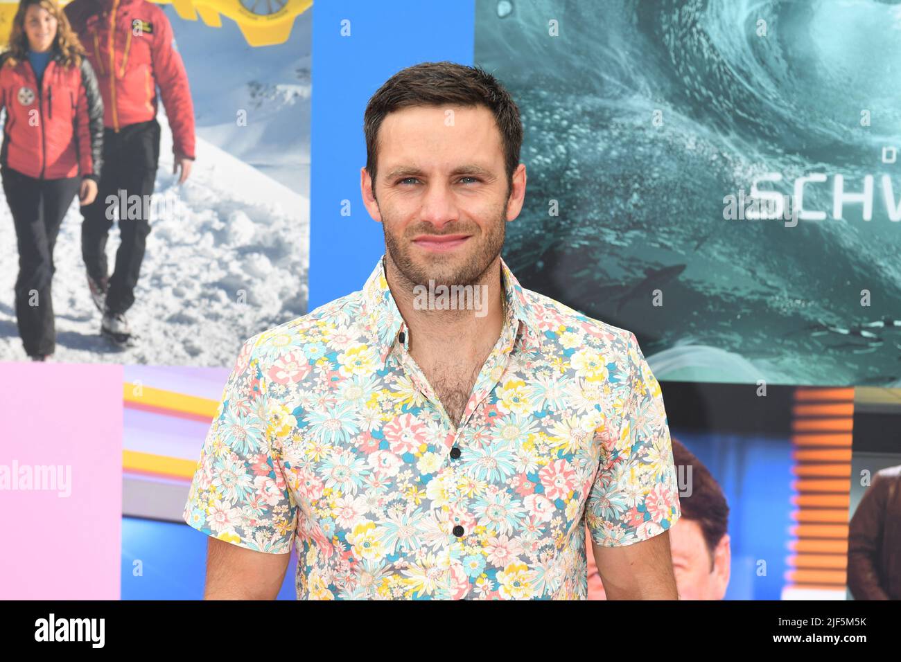 Munich, Germany. 29th June, 2022. Actor Jonathan Müller shows off at ...