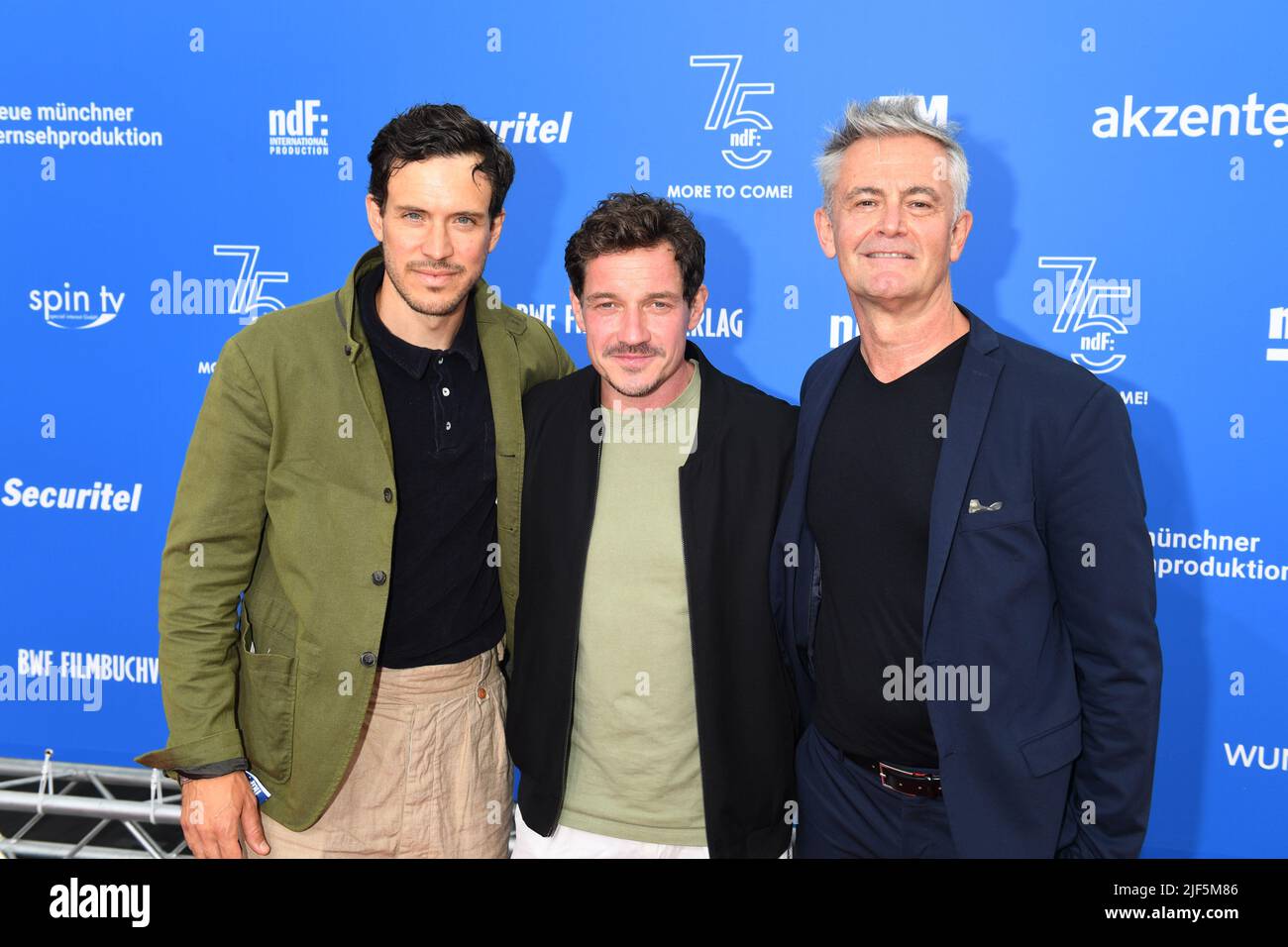 Munich, Germany. 29th June, 2022. Actors Tobias van Dieken (l-r), Markus Brandl and Robert Lohr ...