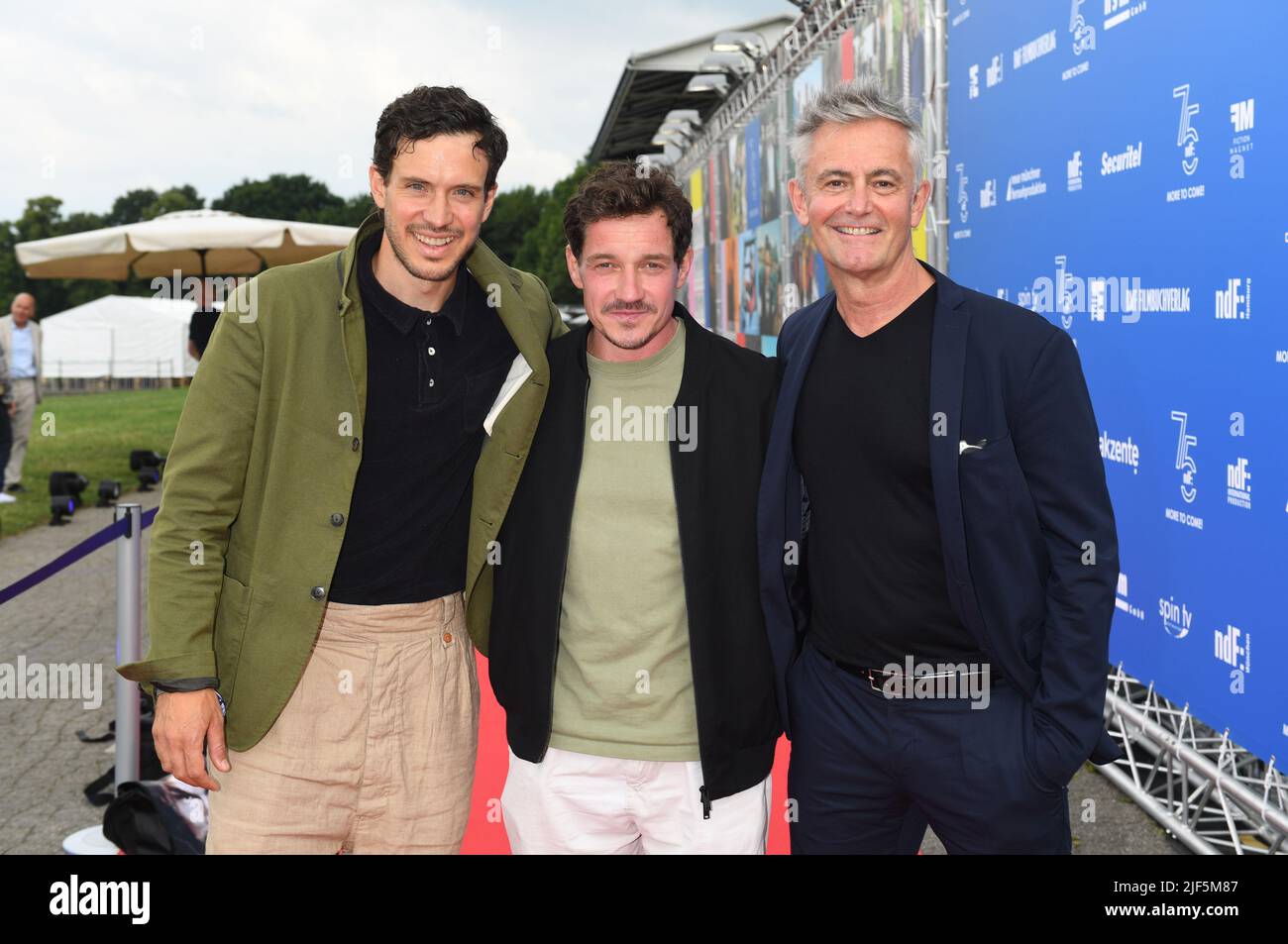 Munich, Germany. 29th June, 2022. Actors Tobias van Dieken (l-r), Markus Brandl and Robert Lohr ...