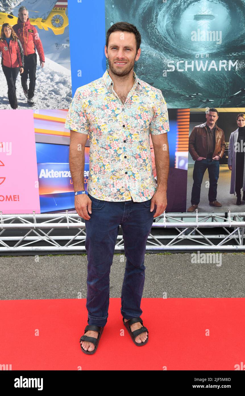 Munich, Germany. 29th June, 2022. Actor Jonathan Müller shows off at the "75 Years of ndF" event ...