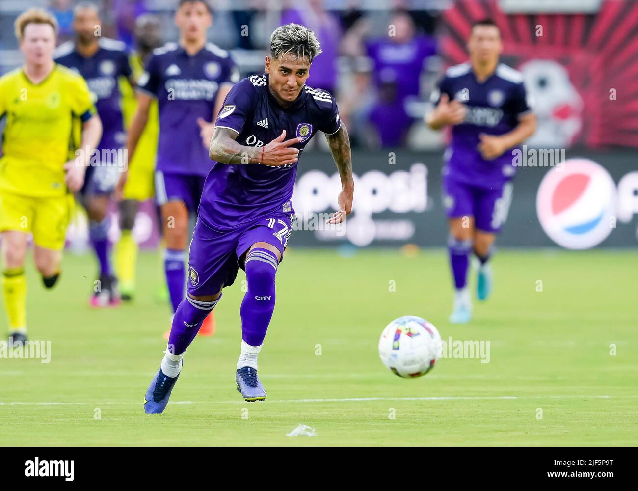 ORLANDO, FL - JUNE 29: Orlando City forward Facundo Torres (17) runs ...