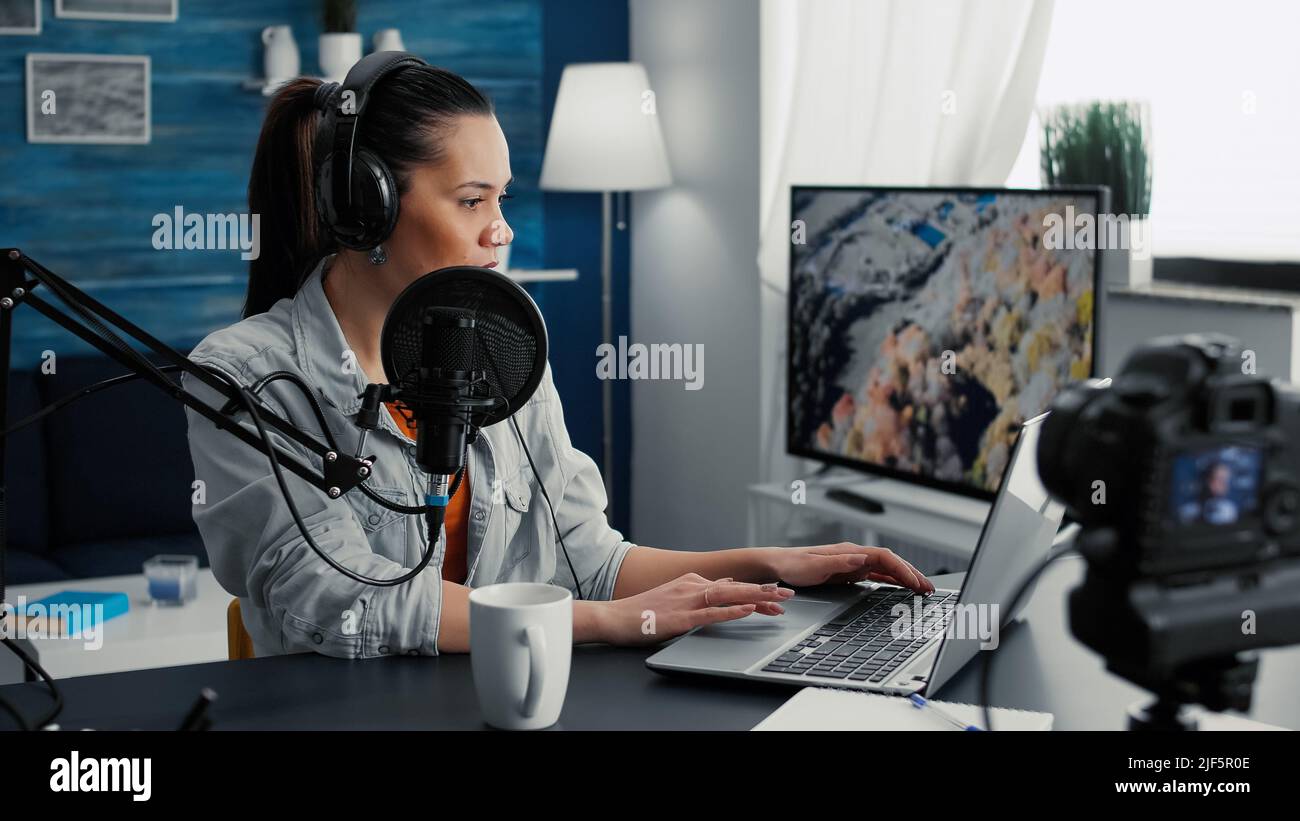 Creative digital content creator answering audience questions while ...