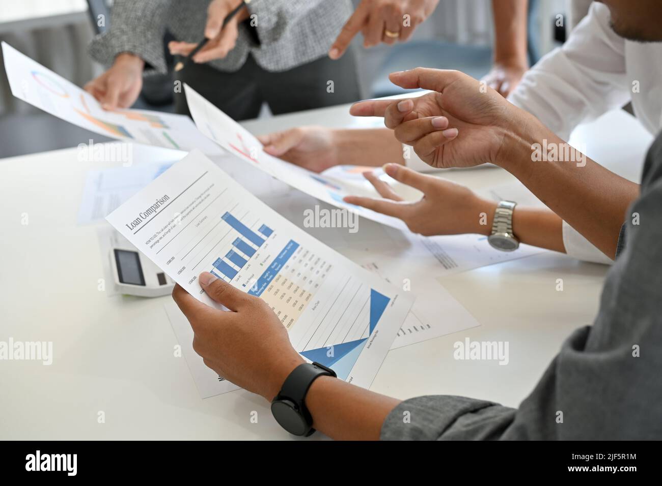 A smart professional male financial strategist in the meeting ...