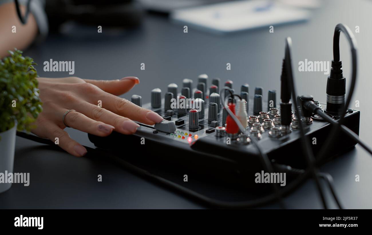 Influencer tweaking audio mixer hi-res stock photography and images - Alamy