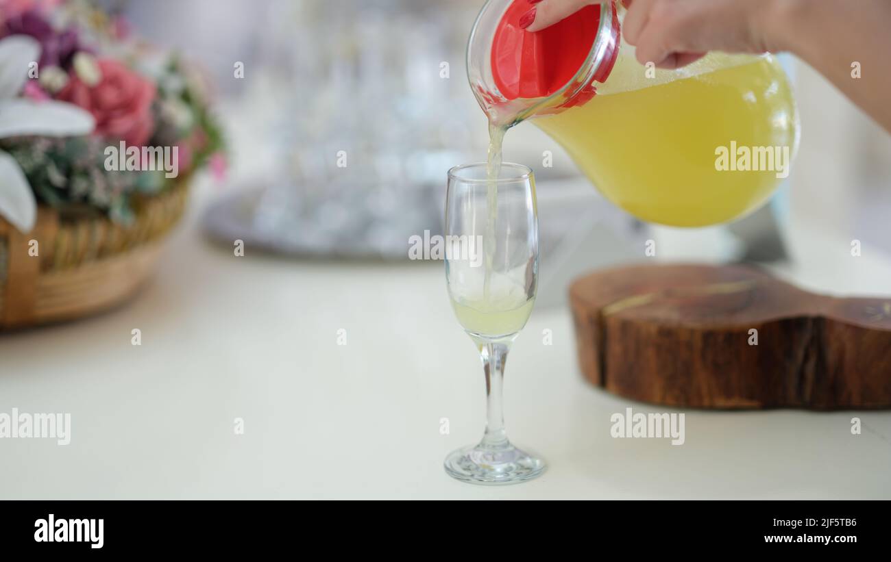 Pouring orange juice from jug hi-res stock photography and images - Alamy