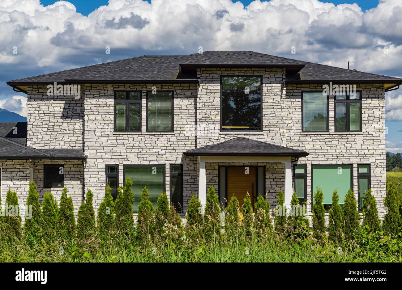 Luxury house in Vancouver, Canada. Big luxury house with a patio ...