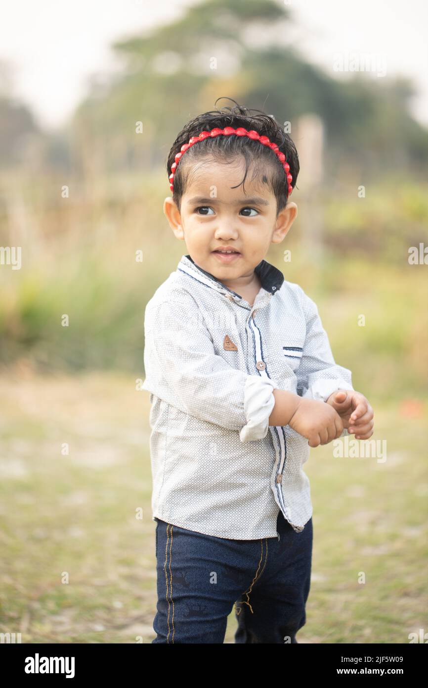 Cute little angel baby girl with a lovely smile Stock Photo - Alamy