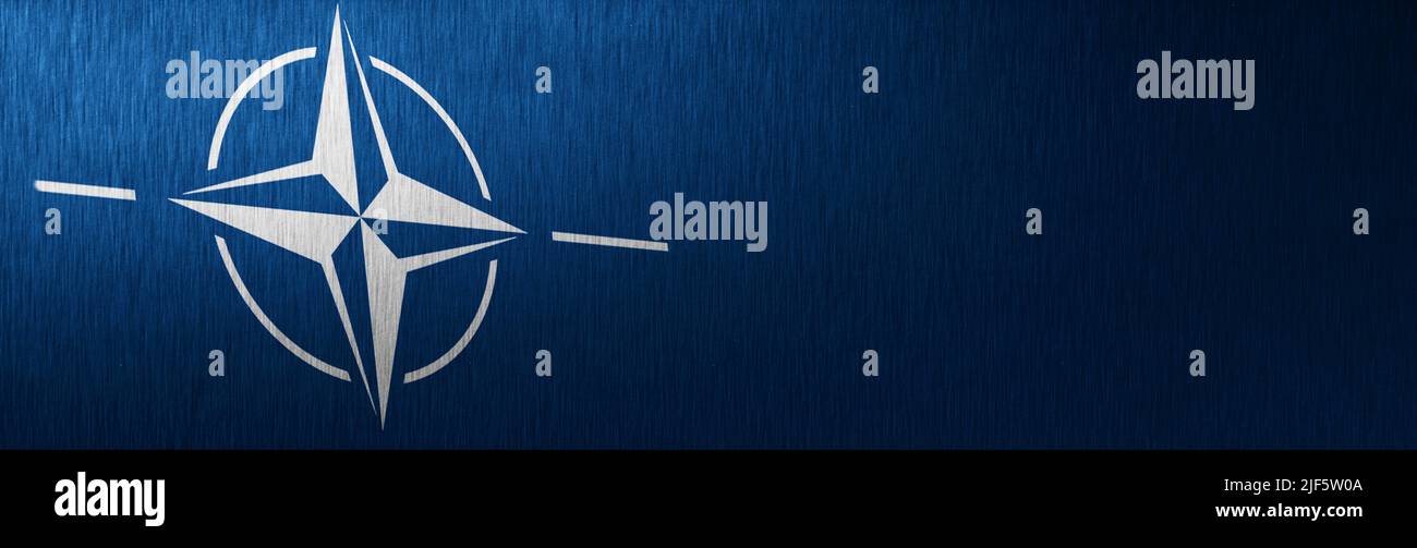 Banner of grunge NATO flag. Dirty NATO flag on a metal surface. Banner ...
