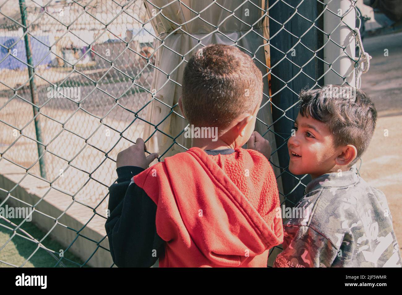 Children playing football in syria hi-res stock photography and images ...