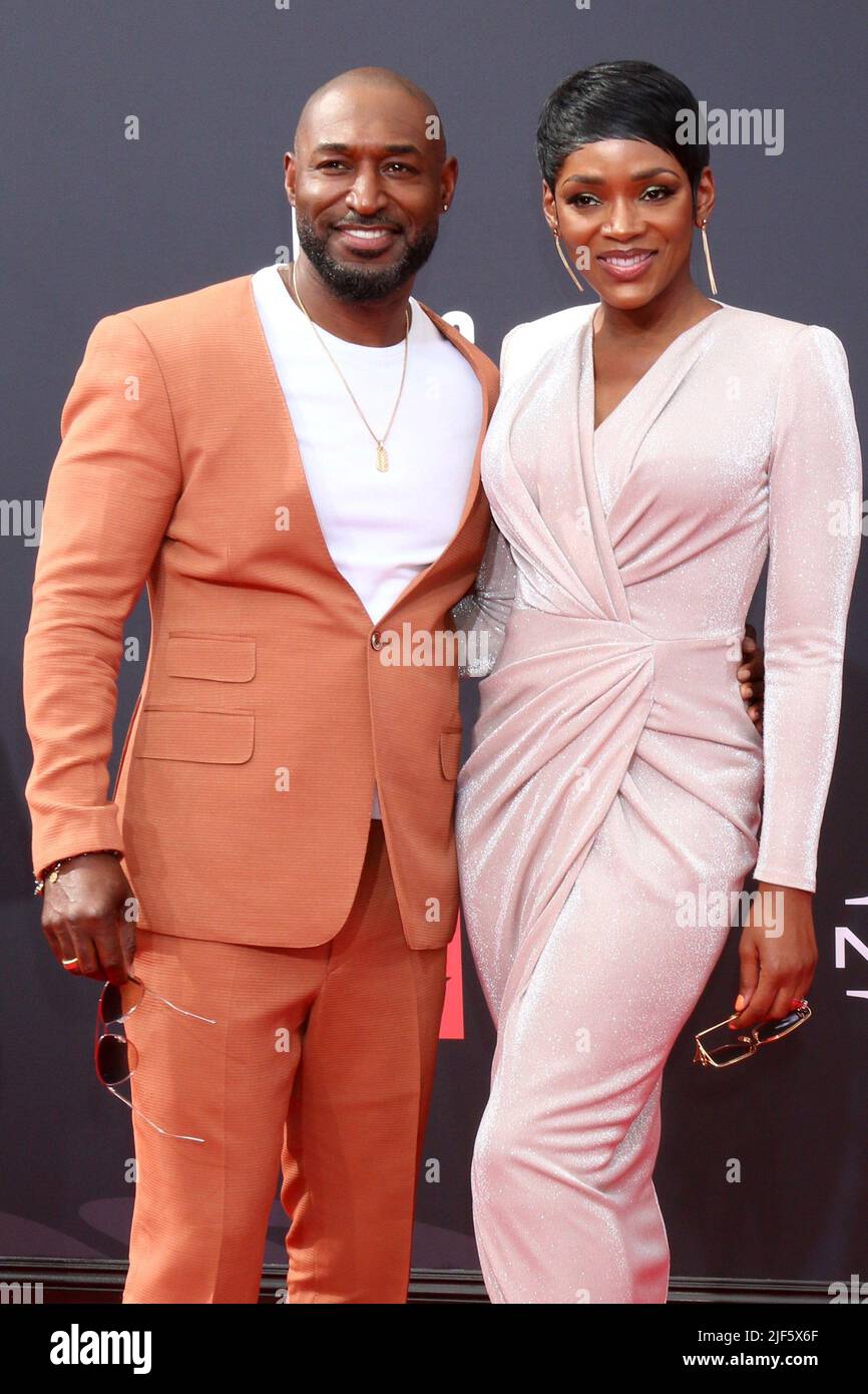 Los Angeles, CA. 26th June, 2022. Adrian Holmes, Caroline Chikezie at ...