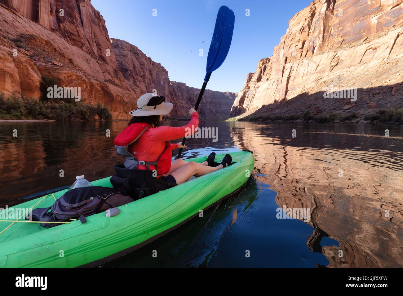 Adventurous Woman on a Kayak paddling in Colorado River Stock Photo - Alamy