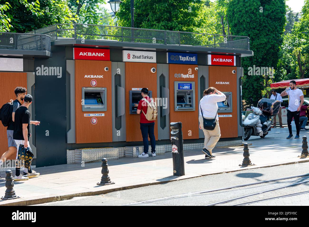 Turkey, Istanbul 02.06.2022: ATMs of various banks on a busy street of ...