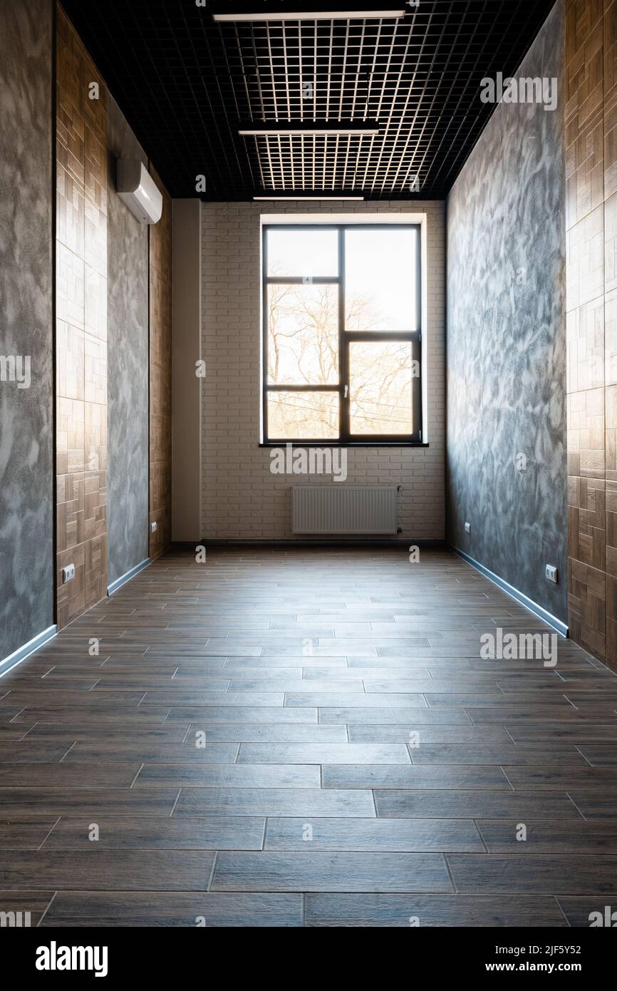 Empty open space office room with window Stock Photo - Alamy