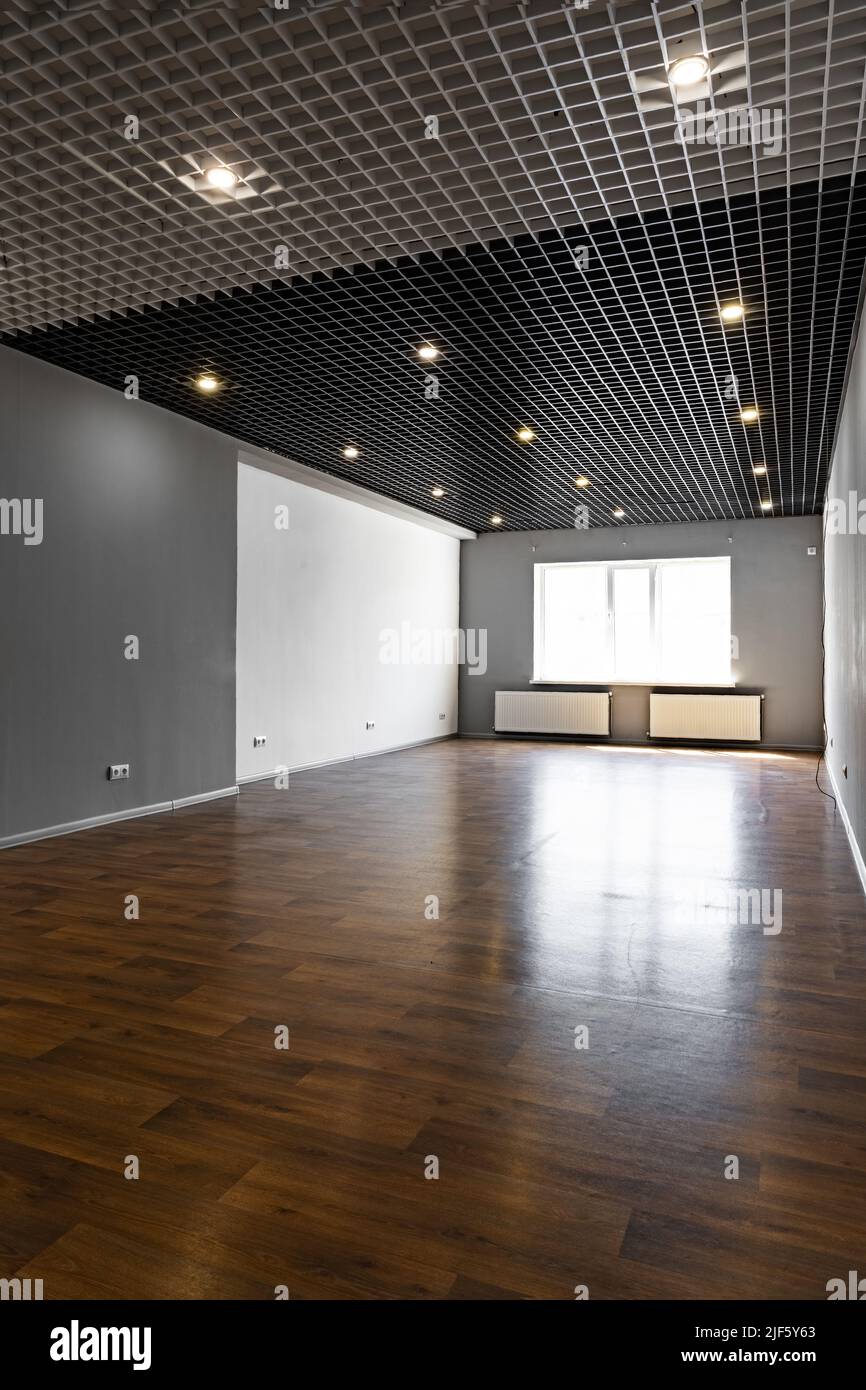 Empty open space office room with window Stock Photo - Alamy