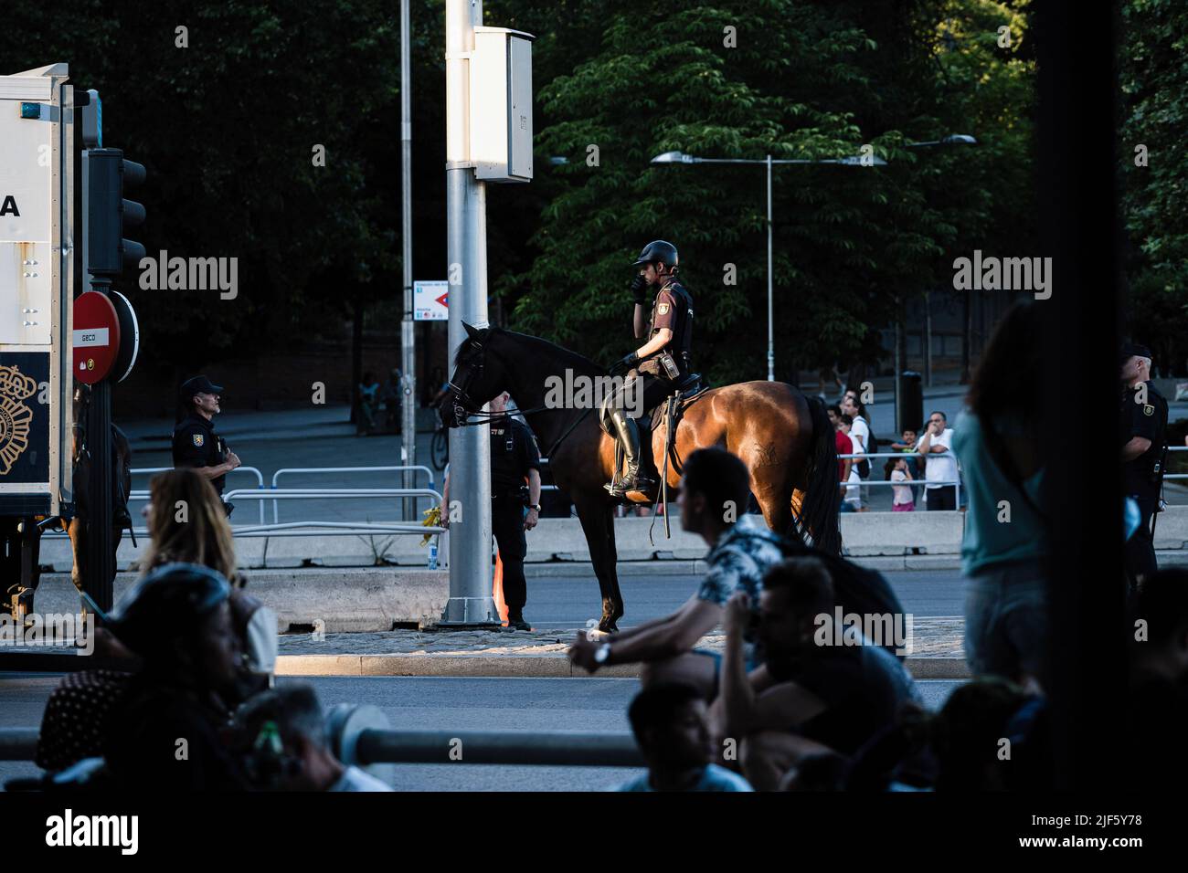Mounted Spanish national police officer guards the street of the Prado ...