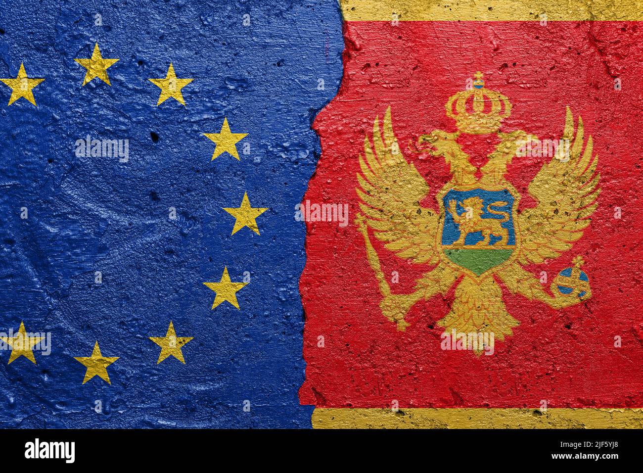 European Union and Montenegro flags - Cracked concrete wall painted ...