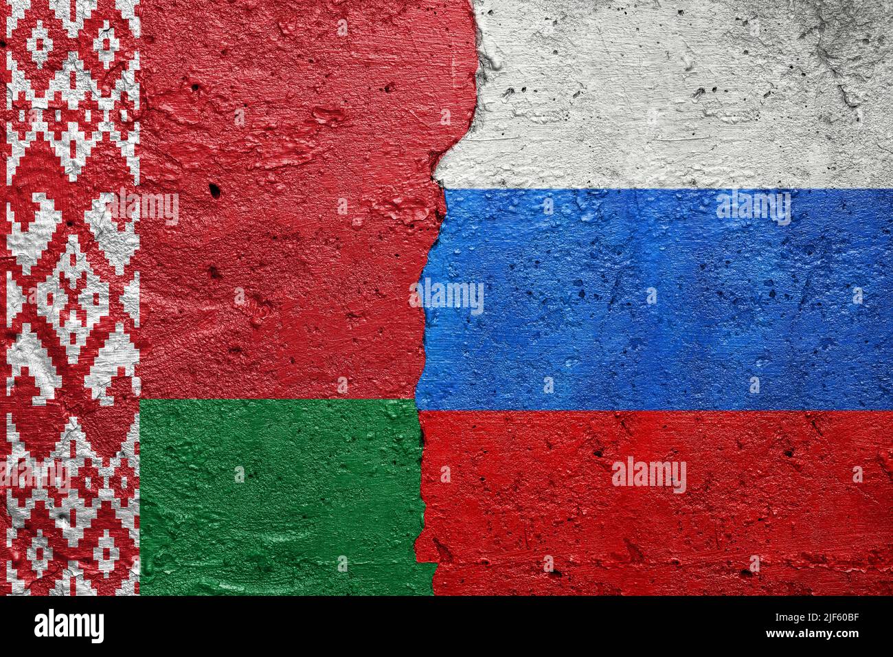 Belarus and Russia - Cracked concrete wall painted with a Belarusian ...