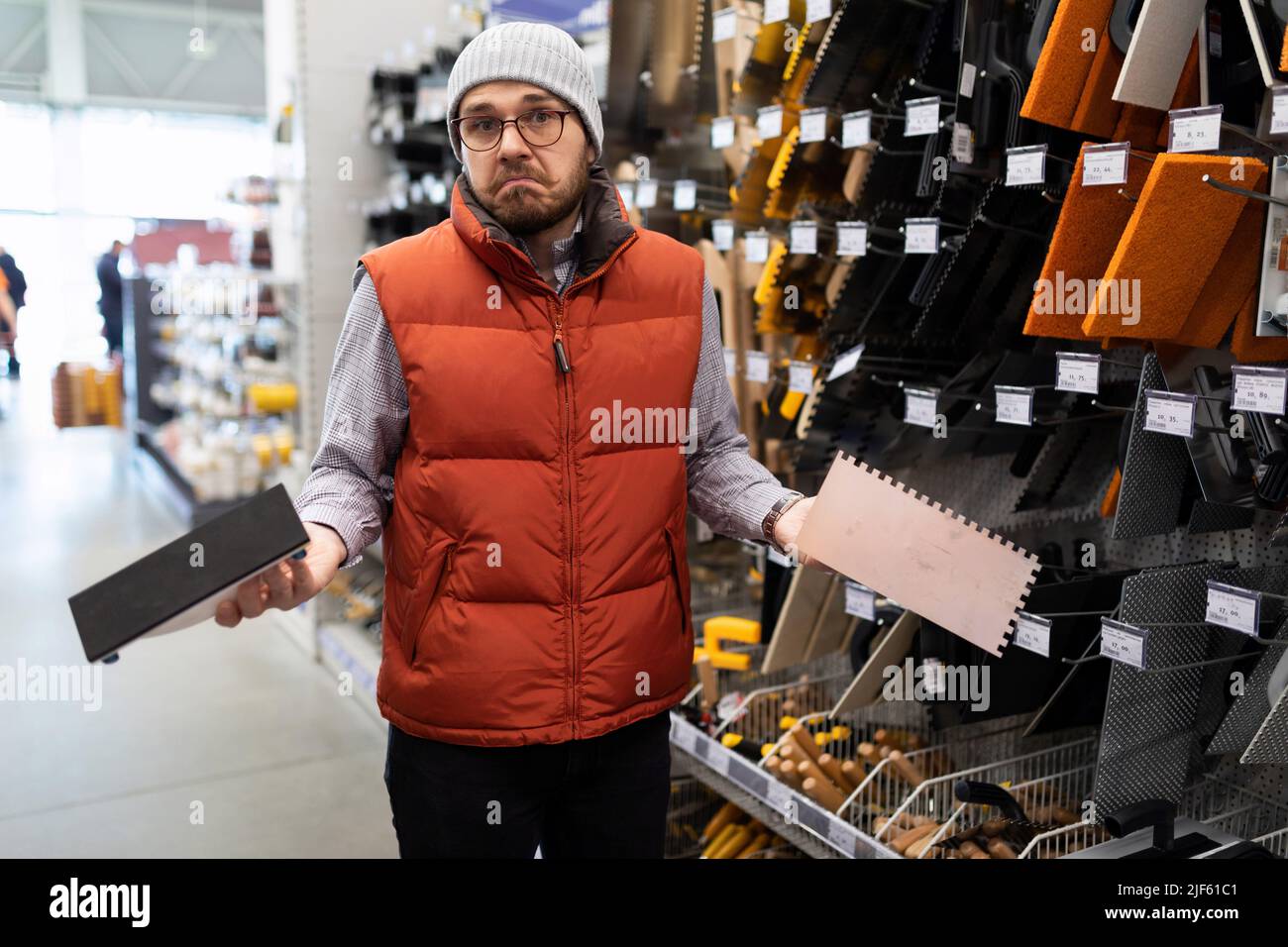 a man can't figure out the difference between two wall plastering tools ...