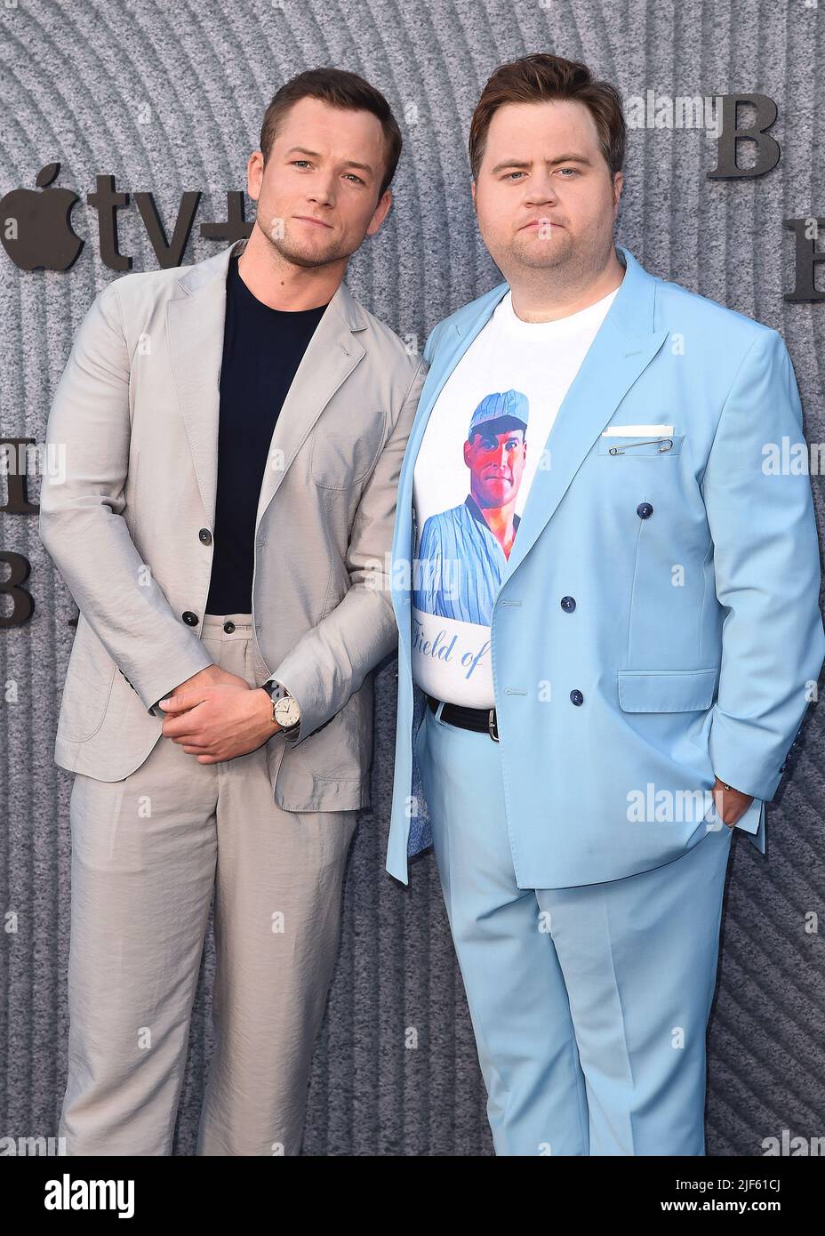 Los Angeles, USA. 29th June, 2022. Taron Egerton and Paul Walter Hauser walking on the red ...