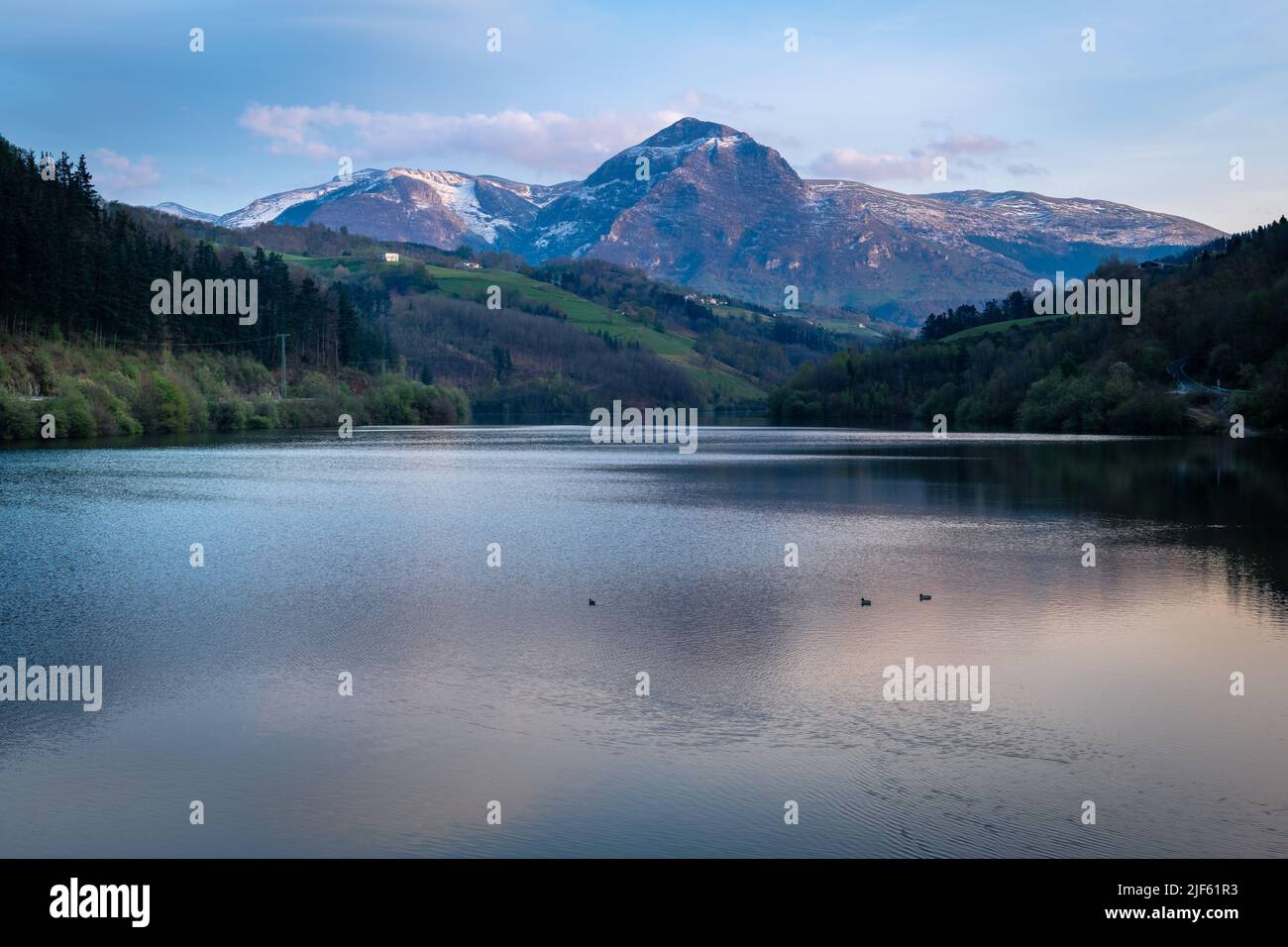Ibiur reservoir with Txindoki mountain as background, Basque Country in ...