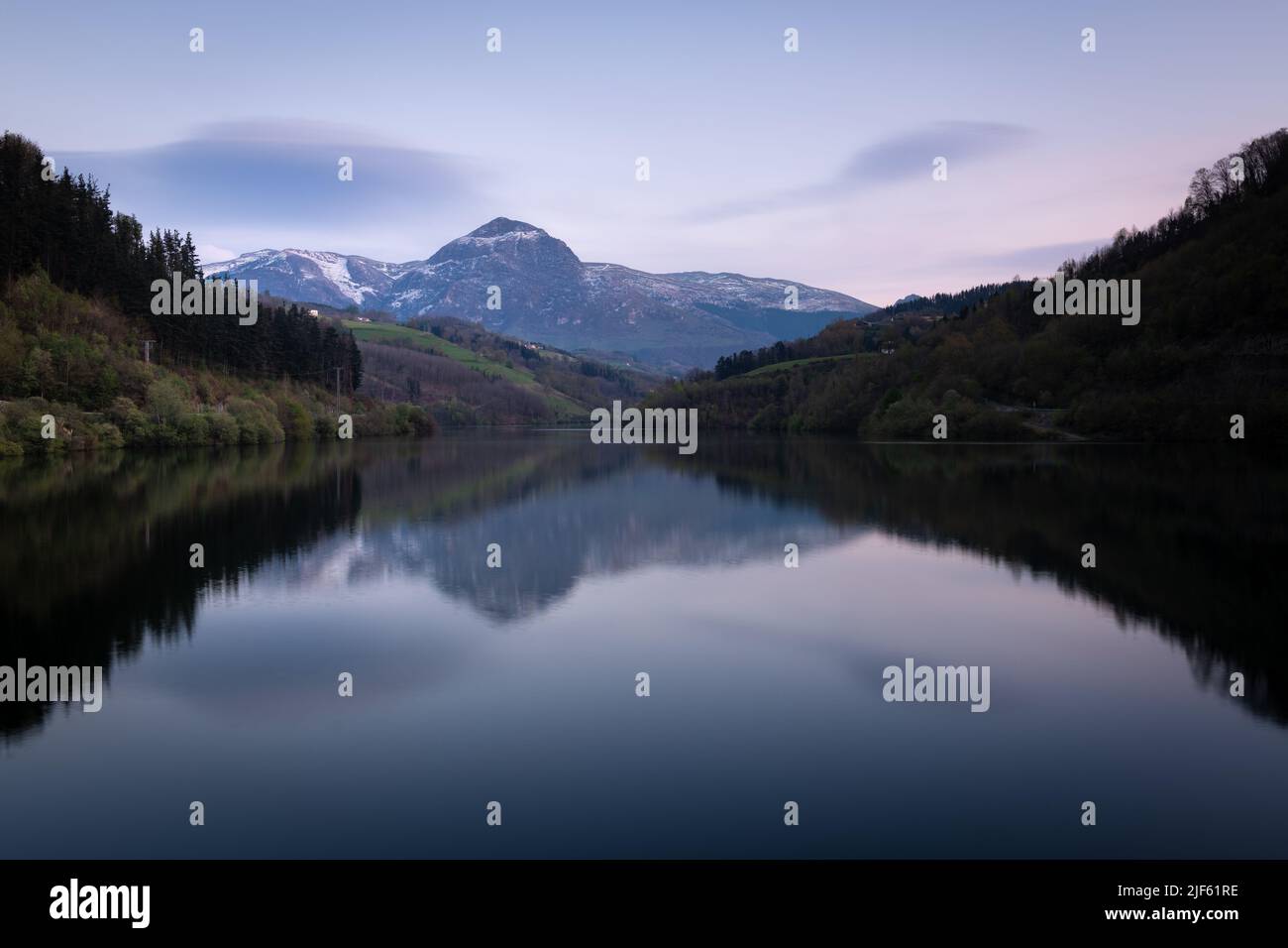 Ibiur reservoir with Txindoki mountain as background, Basque Country in ...