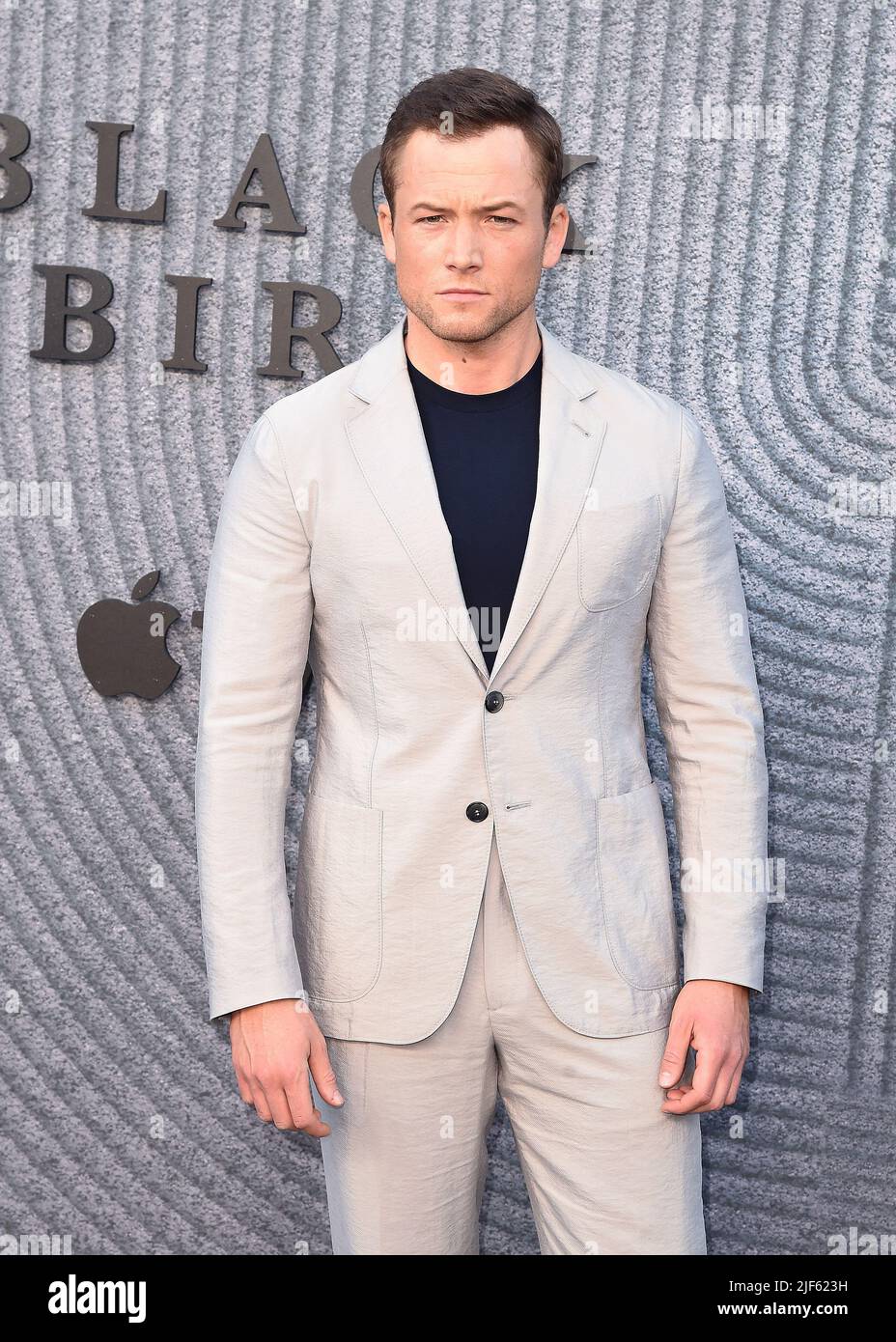 Taron Egerton walking on the red carpet at Apple TV's "Black Bird" red ...