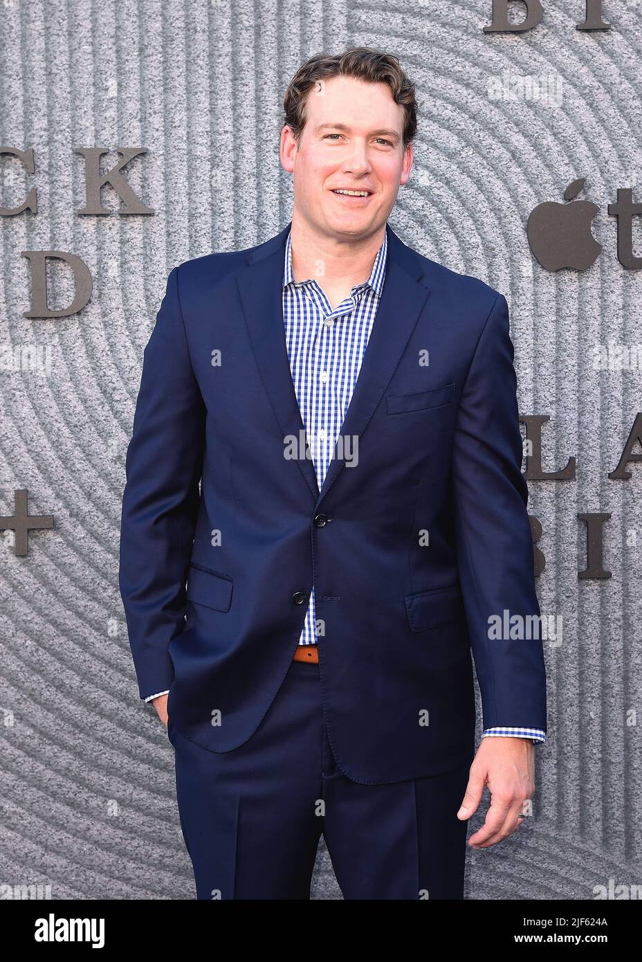 Joe Williamson walking on the red carpet at Apple TV's "Black Bird" red ...