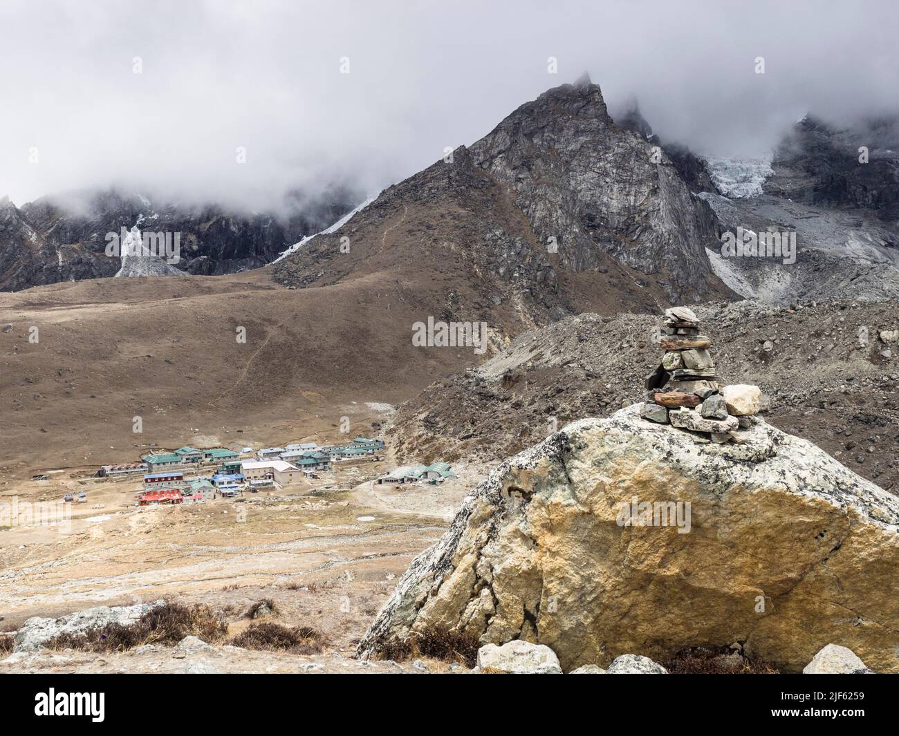 Rock cairn on a boulder on the moraine wall above Lobuche village(4940m ...