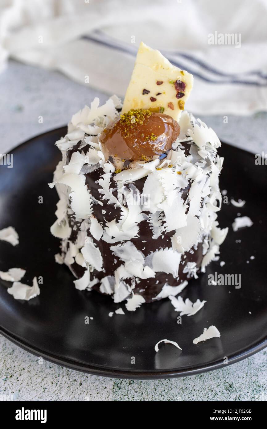 Chestnut cake. Small celebration cake with chestnut inside on a white ...