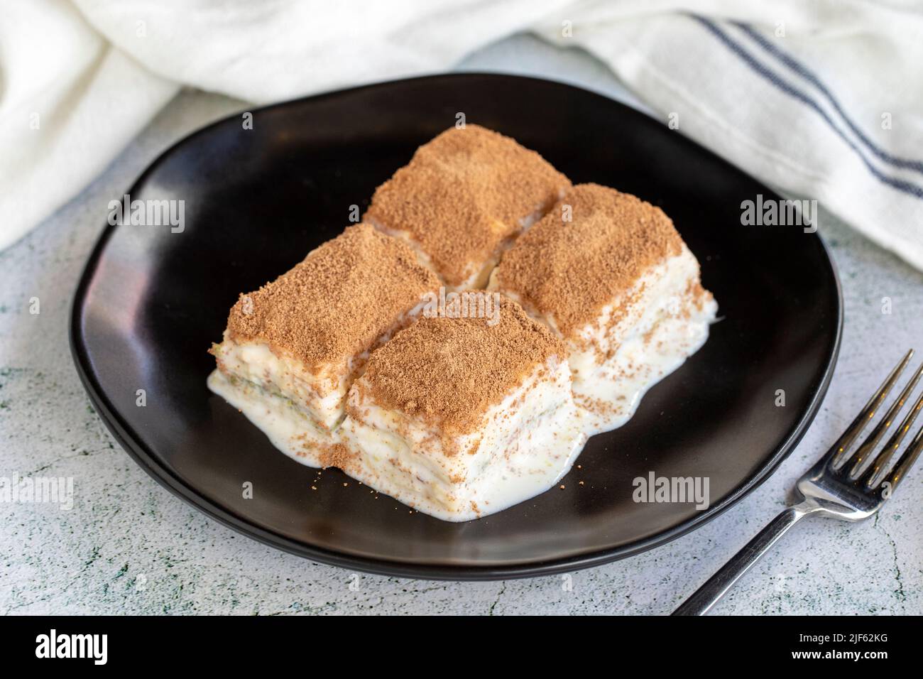 Cold baklava. Baklava with milk on a white background. Turkish cuisine ...