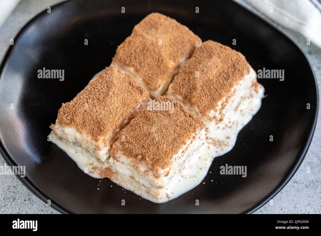 Cold baklava. Baklava with milk on a white background. Turkish cuisine ...