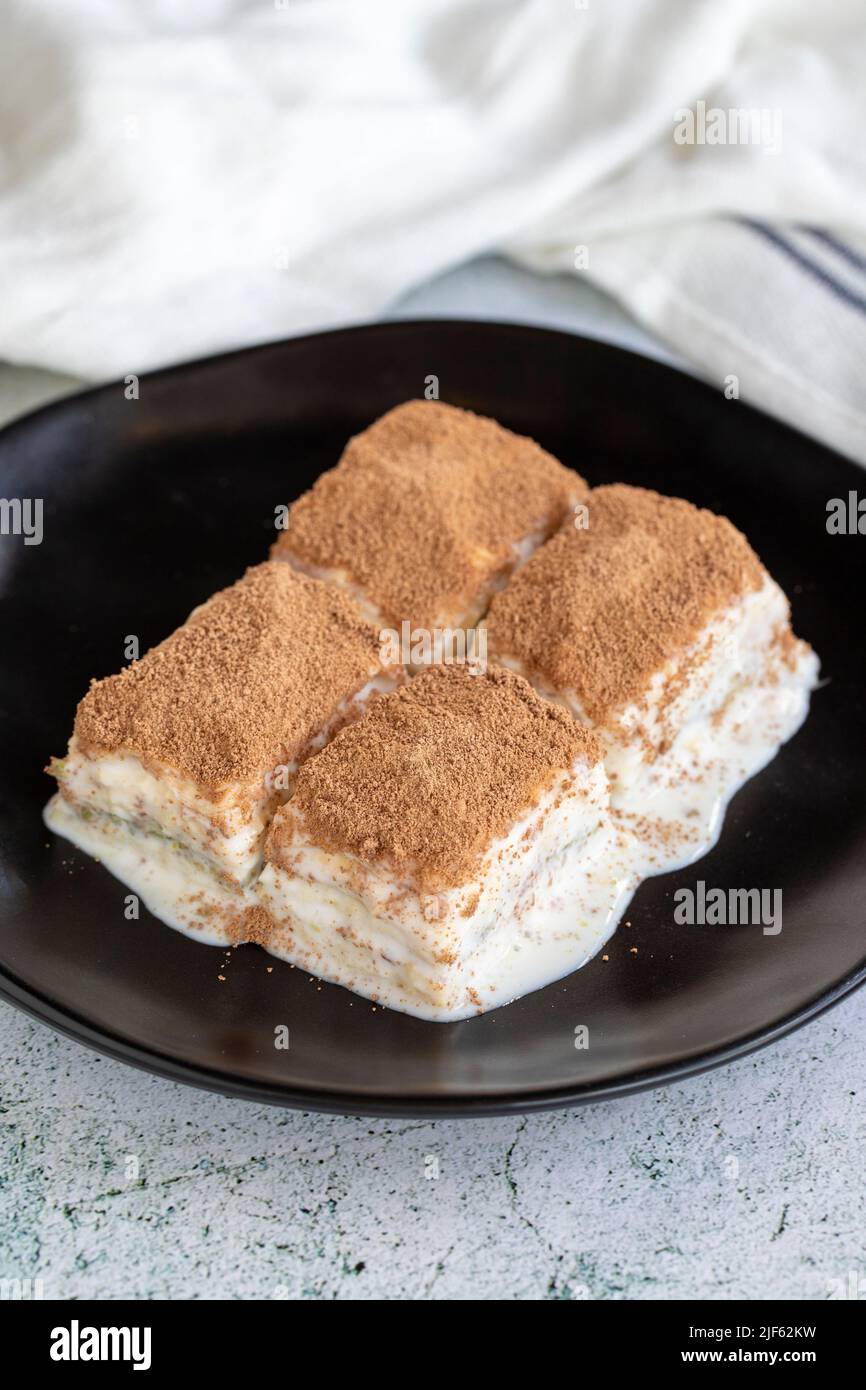 Cold baklava. Baklava with milk on a white background. Turkish cuisine ...