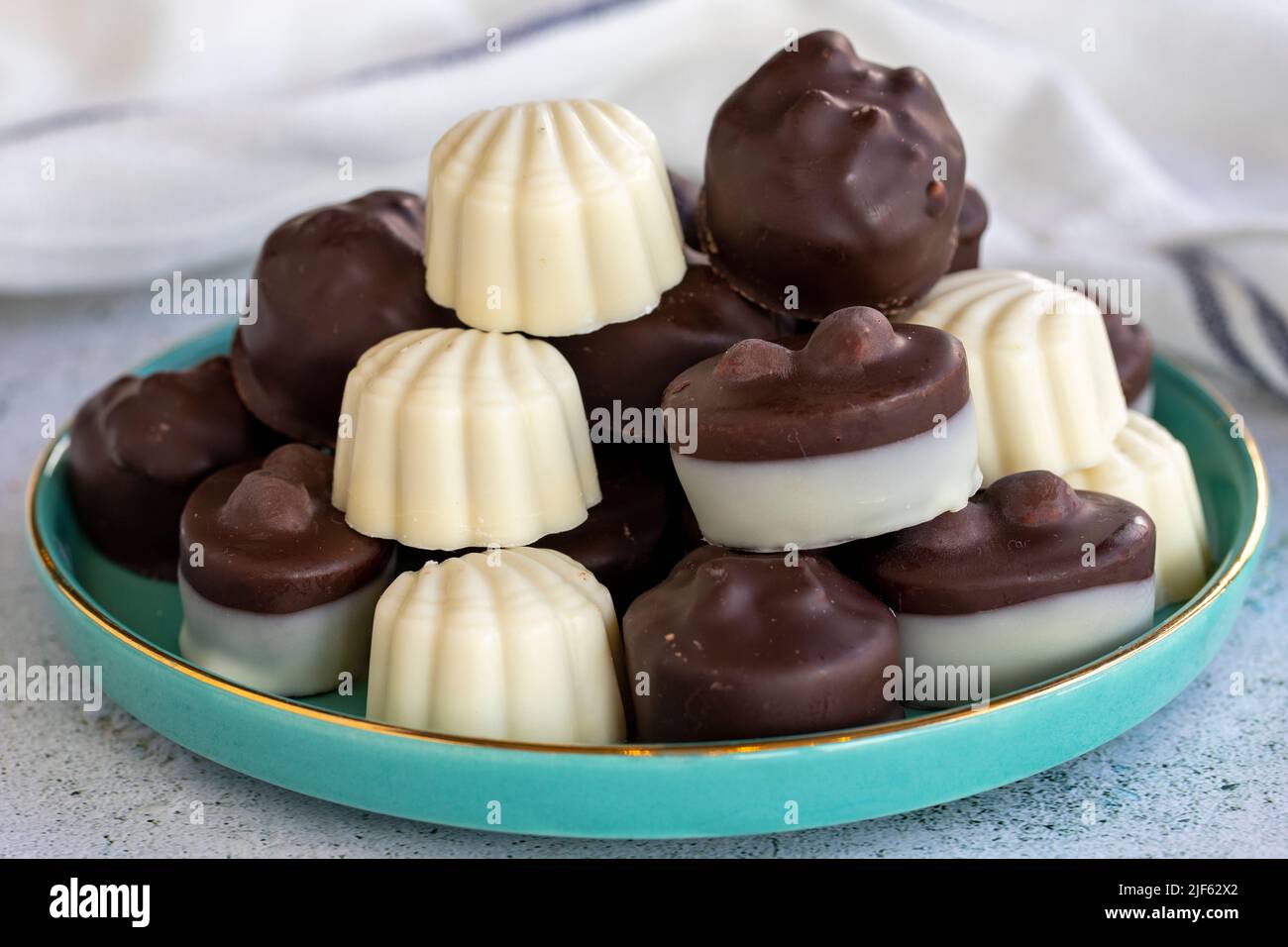 Special types of chocolate. Special hazelnut chocolate on a white ...