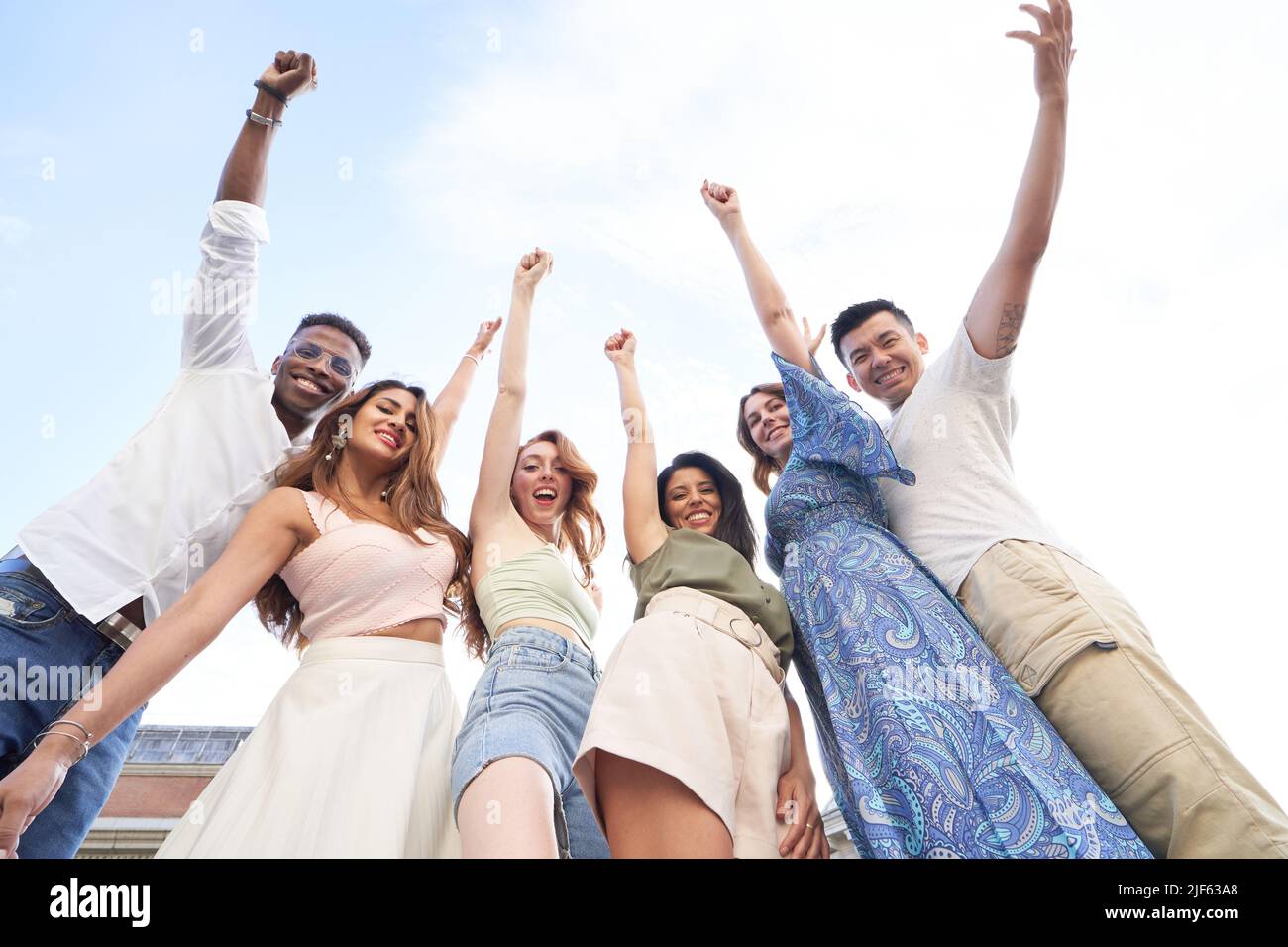 Group posing together hi-res stock photography and images - Alamy